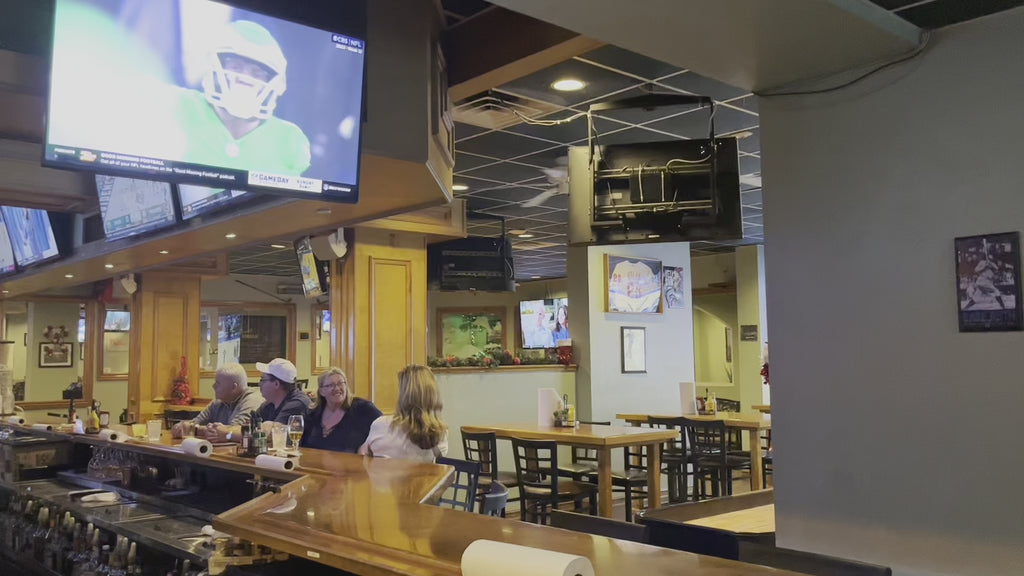 Sunset Grill Oceanfront sports bar also offers burgers, wings & other ...